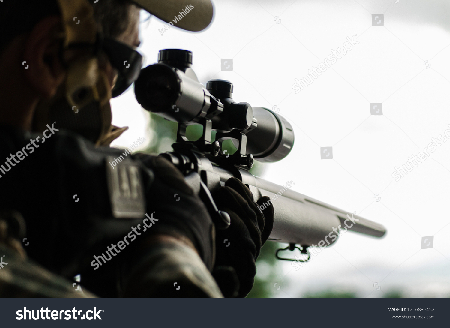 stock-photo-camouflage-wrap-tape-on-sniper-rifle-and-scope-close-up ...